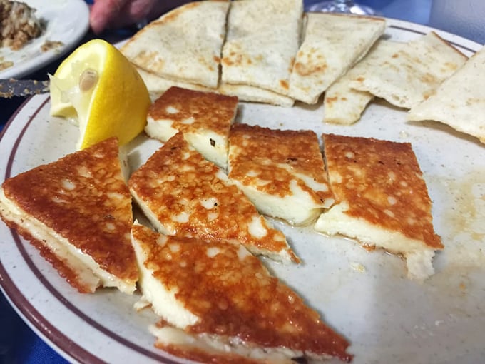 Saganaki – where cheese meets fire in a glorious union that proves the Greeks understood dramatic presentation long before Hollywood existed.