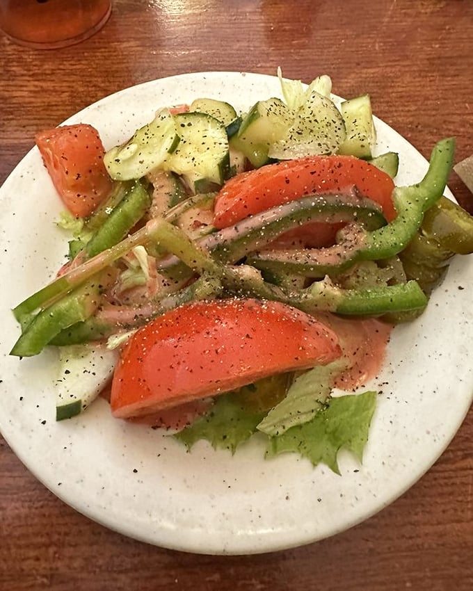 This garden-fresh salad isn't just a healthy option—it's a colorful palette of vegetables that brightens the table before the comfort food parade begins.