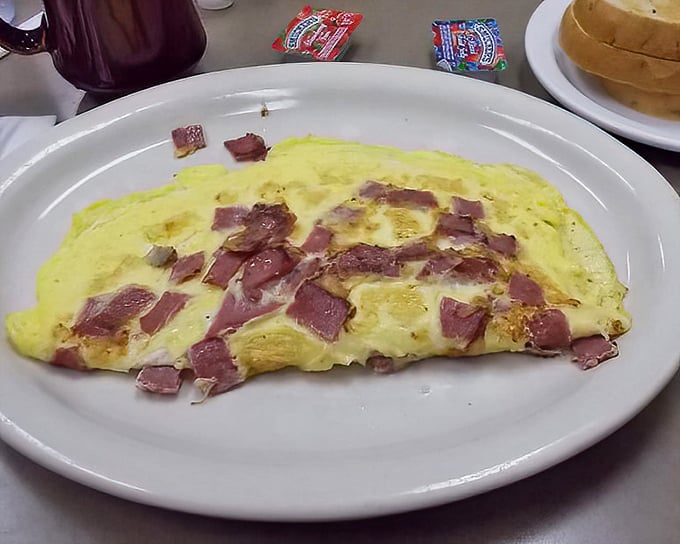 This omelet doesn't just contain meat—it celebrates it. The kind of breakfast that makes you cancel lunch plans and consider a mid-morning nap. 