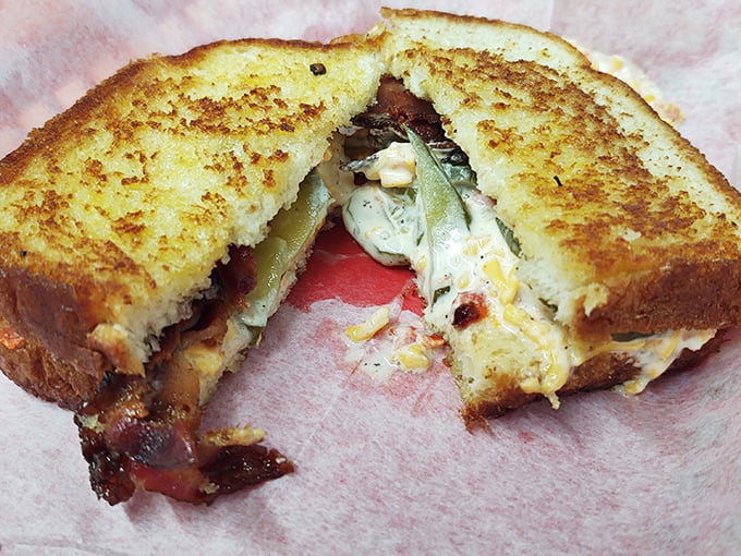 Grilled perfection between two slices of golden bread – this sandwich has more layers than your favorite Netflix drama.