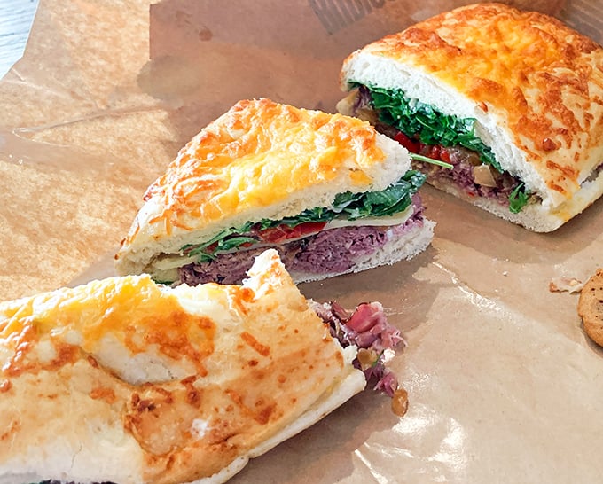 Sandwich perfection isn't just about ingredients—it's about engineering. These stratified layers of deliciousness defy the laws of sandwich physics.