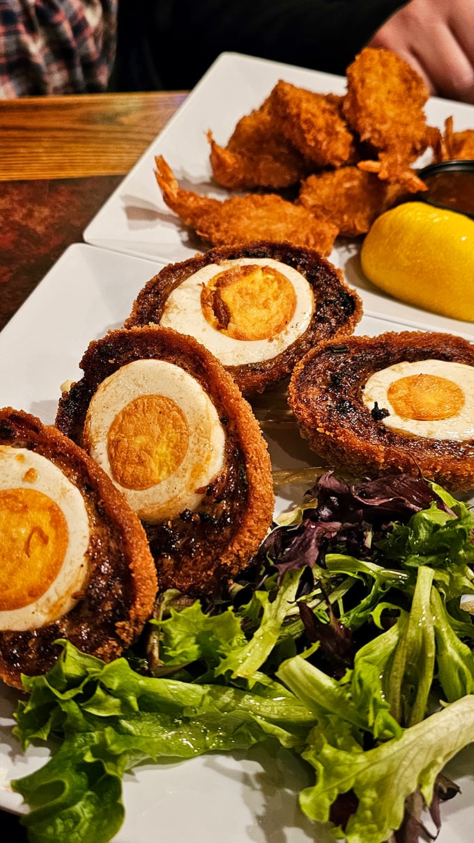 Scotch eggs that would make a Glaswegian weep with joy—crispy exterior giving way to savory sausage and that perfect, jammy yolk center.