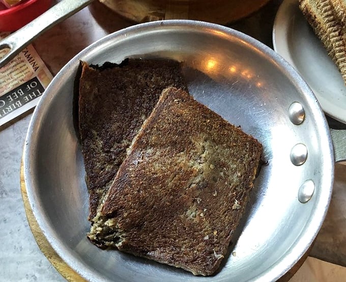 Scrapple: the breakfast food that requires courage the first time and creates addiction every time after. Crispy outside, tender inside—Pennsylvania on a plate.