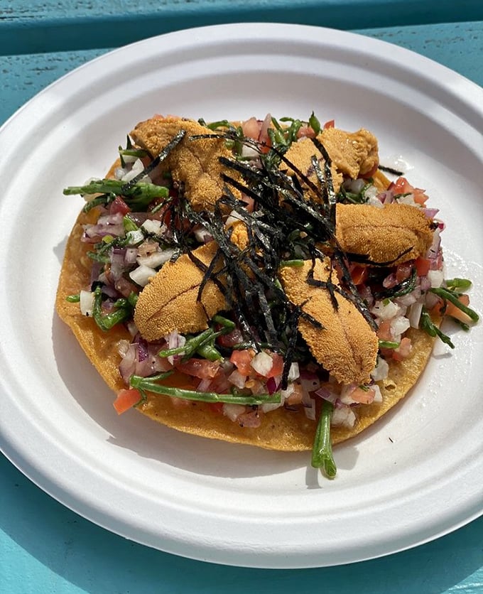 This isn't just a tostada—it's sea urchin transformed into a celebration. Vibrant vegetables and delicate uni create a California postcard you can eat.
