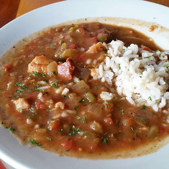 The Seafood Gumbo brings New Orleans to the Emerald Coast—a slow-cooked masterpiece that's worth every savory, spicy spoonful.