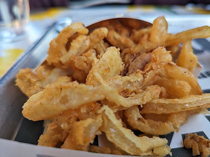 Crispy, golden, addictive – these shoestring onions aren't sidekicks, they're scene-stealers. Like potato chips and onion rings had a delicious love child.