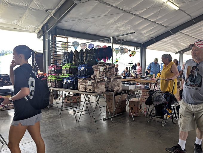 The covered pavilions buzz with activity as shoppers navigate the maze of merchandise. Every turn reveals a potential find.
