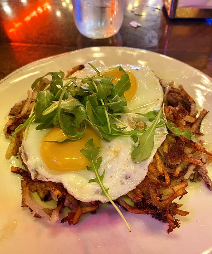 The Short Rib Hash arrives like a headliner – those sunny-side-up eggs and fresh arugula aren't just garnish, they're essential band members.
