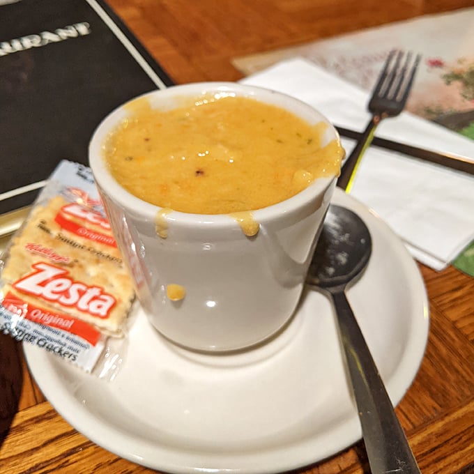 A mug of shrimp bisque that doesn't just warm your hands but hugs your soul. That little packet of crackers knows it's just along for the ride.