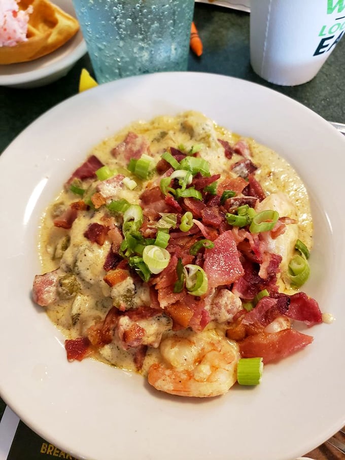 A seafood symphony in creamy sauce—this shrimp and grits dish has more layers than your favorite prestige TV drama.