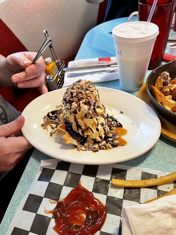 This isn't just dessert—it's therapy on a plate. Ice cream, chocolate, caramel, and nuts creating a symphony that makes adult problems temporarily vanish.