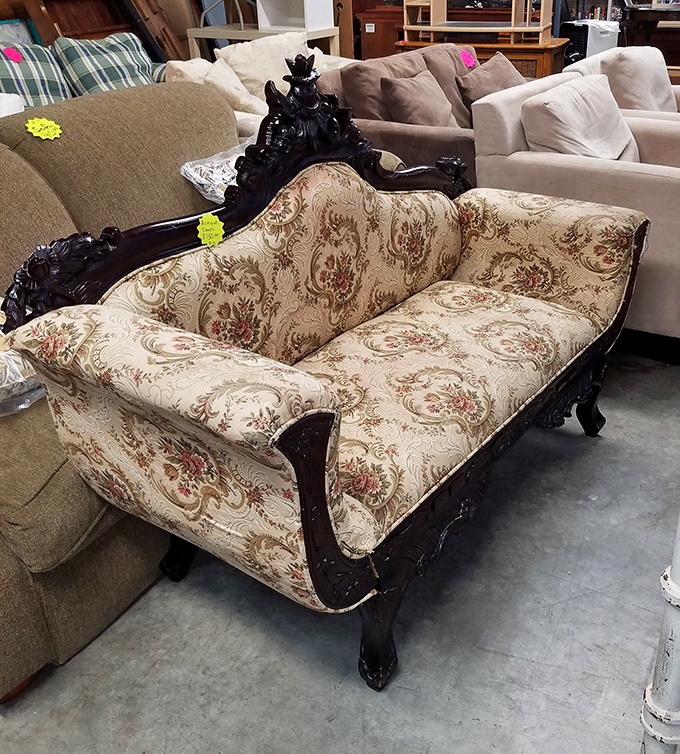 That's not just a sofa—it's a Victorian conversation piece that could turn your living room into a period drama set.