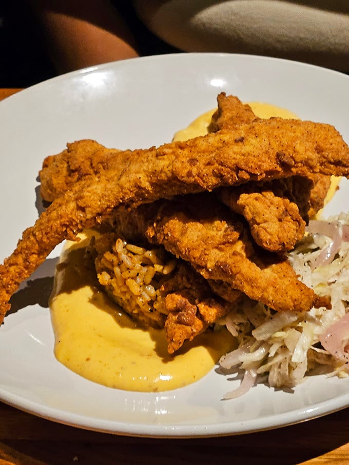 This Southern fried catfish isn't just dinner; it's a crunchy, golden ticket to flavor town, complete with creamy sauce.