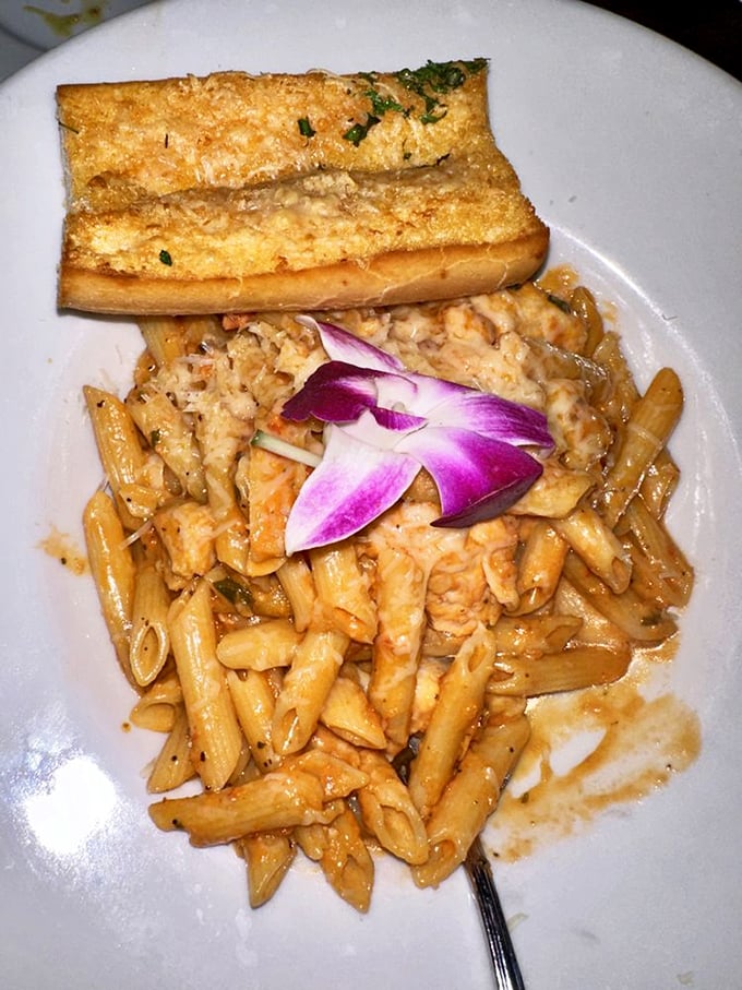 Their spicy seafood pasta – where penne meets the sea in a creamy liaison that would make Neptune himself put down his trident and pick up a fork.