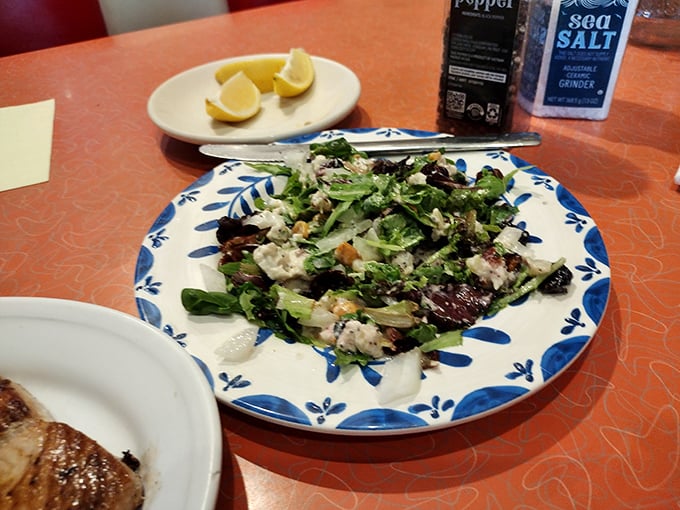 This isn't just any salad—it's a celebration of fresh greens, nuts, and cheese that would make even confirmed carnivores consider the virtues of vegetables.
