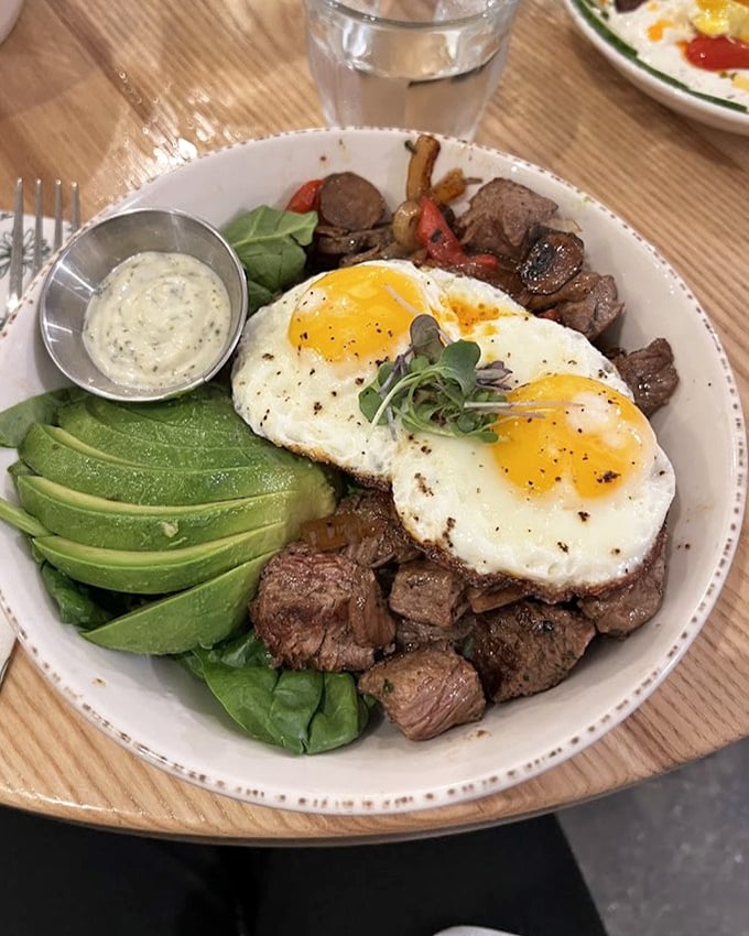 Steak and eggs: the breakfast power couple that never goes out of style, with sliced avocado playing the stylish third wheel.