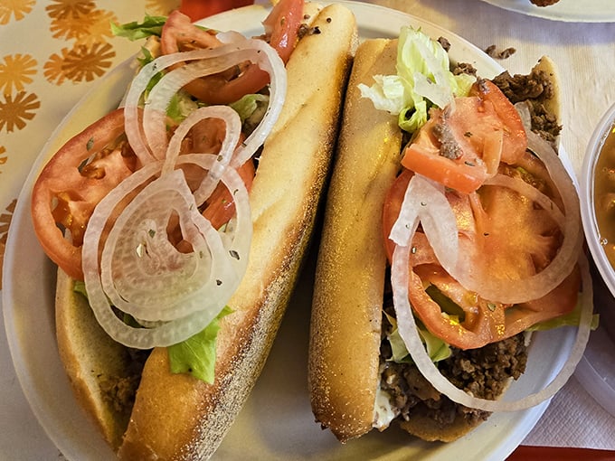 These steak hoagies aren't trying to impress food critics—they're too busy satisfying actual hunger with fresh tomatoes and perfectly grilled meat.