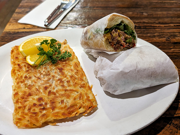 The ultimate power lunch: crispy hash browns that shatter like glass paired with a wrap that's bursting with fresh ingredients.