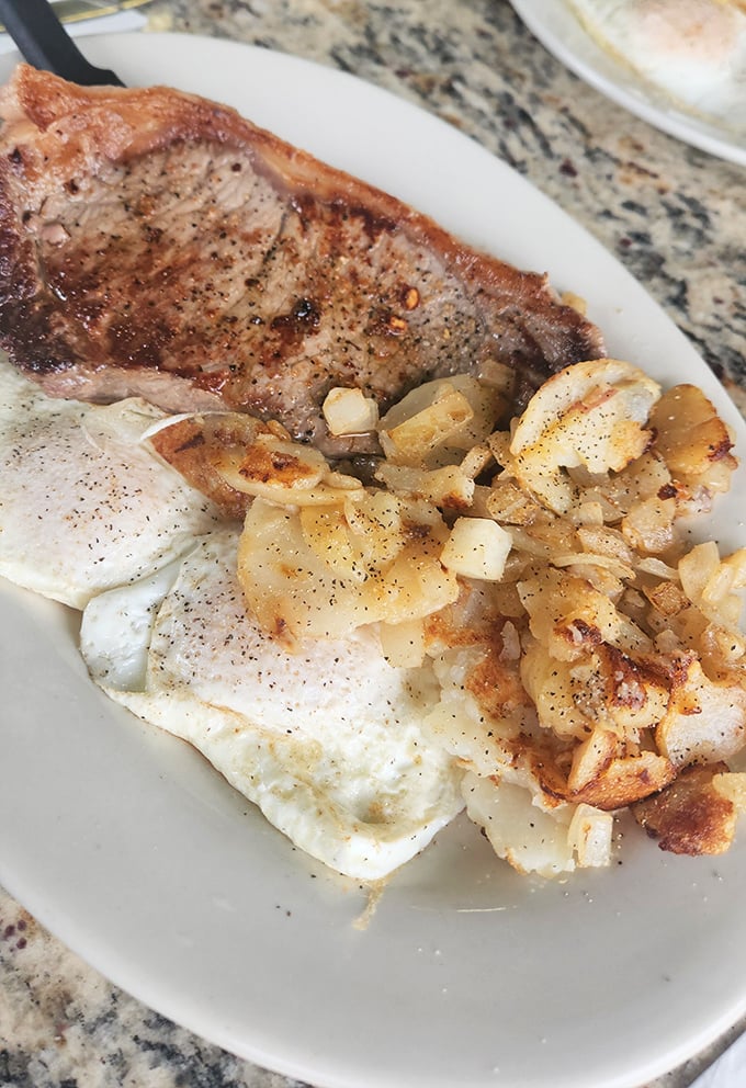 When steak meets eggs, magic happens – especially when those home fries join the party looking crispy and gorgeous.