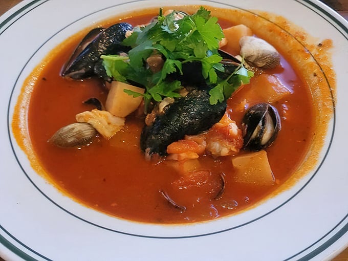 Ed's Portuguese Fish Stew brings the Atlantic to your table—a tomato-rich broth cradling tender seafood and potatoes that would make any fisherman's grandmother proud.