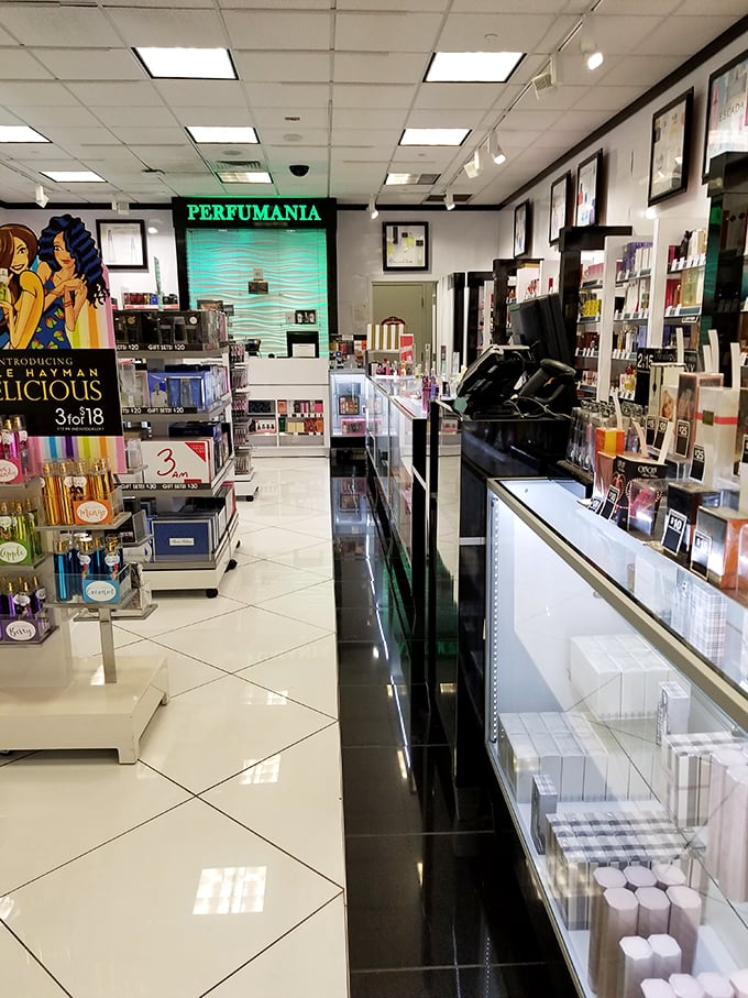 Perfumania: where scent dreams come true and wallets get lighter. The pristine displays are arranged with military precision, ready for your olfactory exploration.