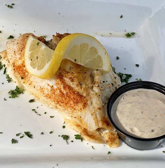 The ocean called—it wants its flavor back. This perfectly broiled flounder with lemon and house-made sauce makes landlocked Pennsylvania feel coastal.