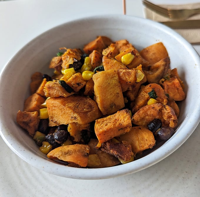 Sweet Potato Hash that's doing the impossible – making vegetables the most exciting thing on the table. Those colors could brighten anyone's morning.