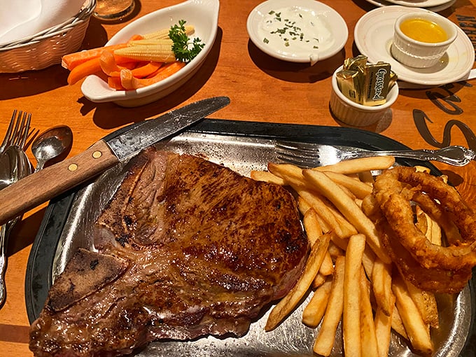 This T-bone doesn't just satisfy hunger—it conquers it. Served on a hot plate that keeps sizzling until the very last bite, with fries that don't play second fiddle.