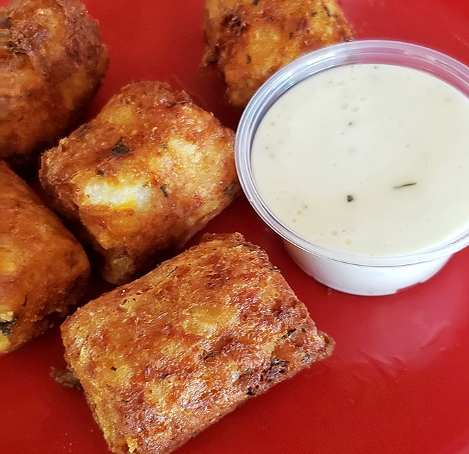 These golden-brown tater kegs aren't just appetizers, they're potato perfection that could start their own fan club. Dip-worthy delights!