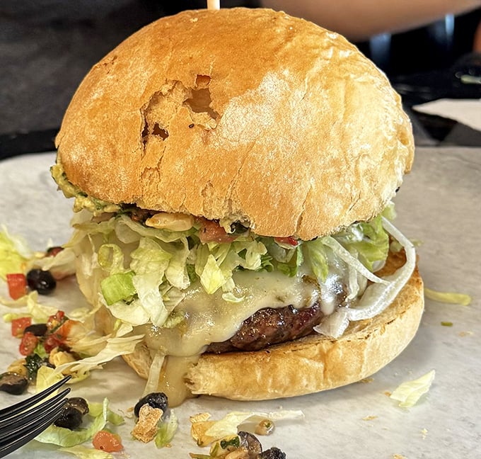 Southwest flavors meet Virginia hospitality. This burger doesn't just cross borders – it eliminates them in one delicious, messy bite.