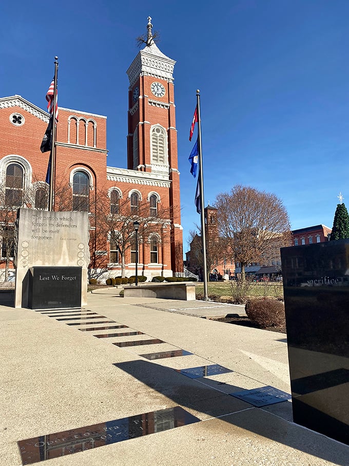 The courthouse that doubles as an arborist's conversation piece. Greensburg's famous Tower Tree proves that government buildings can actually grow something besides paperwork.