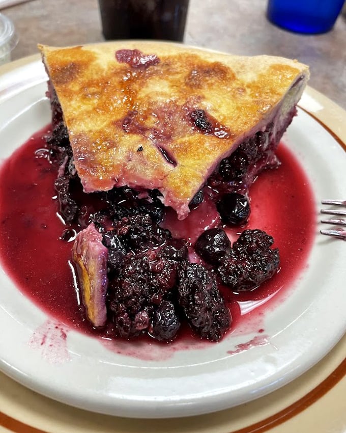 Berry pie so vibrant it looks like it's blushing – the perfect marriage of sweet, tart, and "I'm definitely ordering another slice."