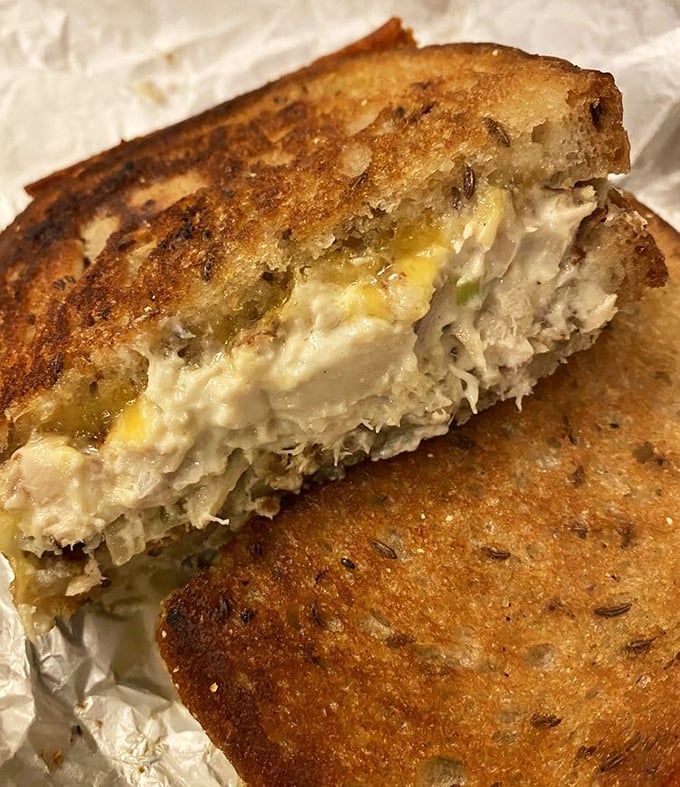 Whoever said tuna melts can't be exciting hasn't seen this beauty—golden-toasted bread embracing a filling that makes canned tuna weep with inadequacy.