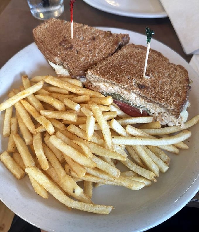 Even lunch gets the royal treatment—a golden-grilled sandwich with fries so perfectly crisp they deserve their own fan club.
