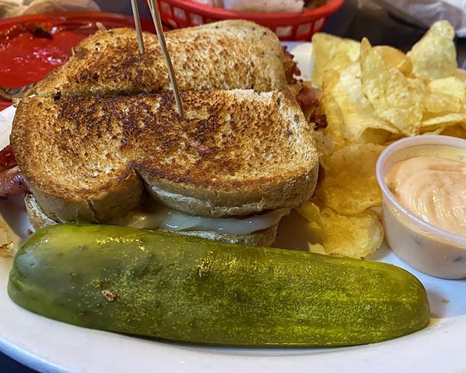 This grilled sandwich isn't just lunch – it's architecture. The perfectly toasted bread creates the ideal foundation for what lies within.