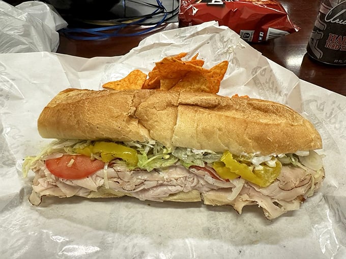 This turkey hoagie demonstrates the beauty of simplicity—fresh ingredients, proper proportions, and the kind of bread that makes carb-counting seem like sacrilege.