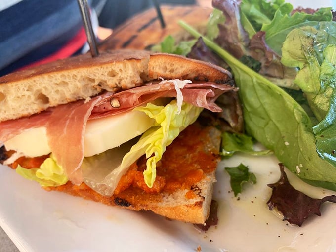 The Italian sandwich that launched a thousand road trips – prosciutto, cheese, and fresh greens on bread that crackles with each bite.