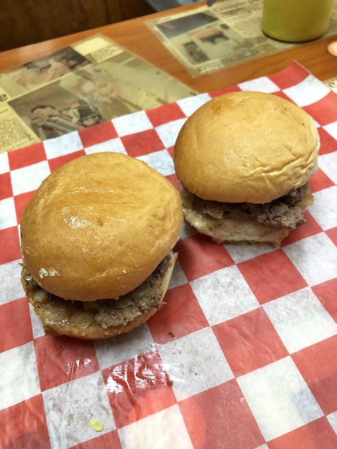Two perfect specimens on their checkered paper throne—no frills, no gimmicks, just burger perfection multiplied by two.