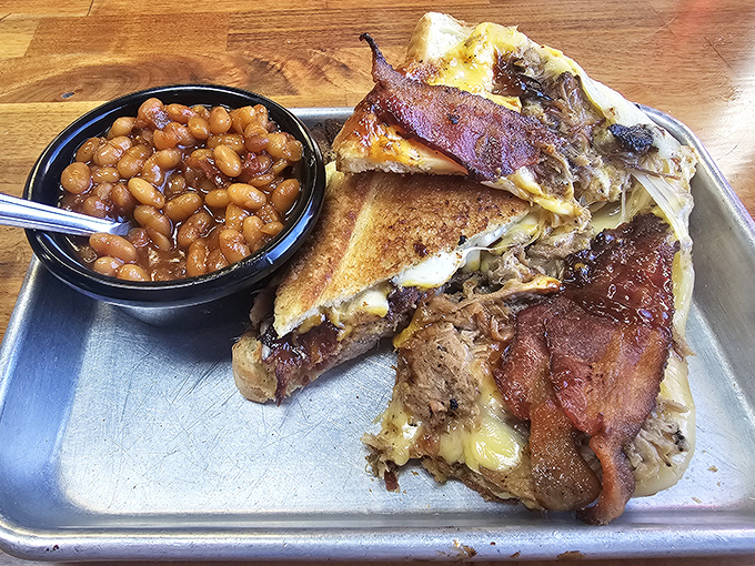 The Ultimate Grilled Cheese isn't messing around – layers of meat, cheese, and Texas toast that would make your cardiologist nervously clear their throat.