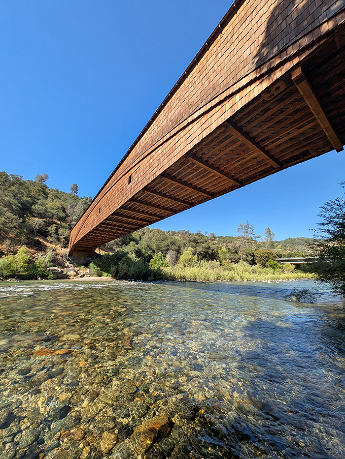 Looking up from river level, you'd never guess this wooden wonder is the longest single-span covered bridge still standing in the world.
