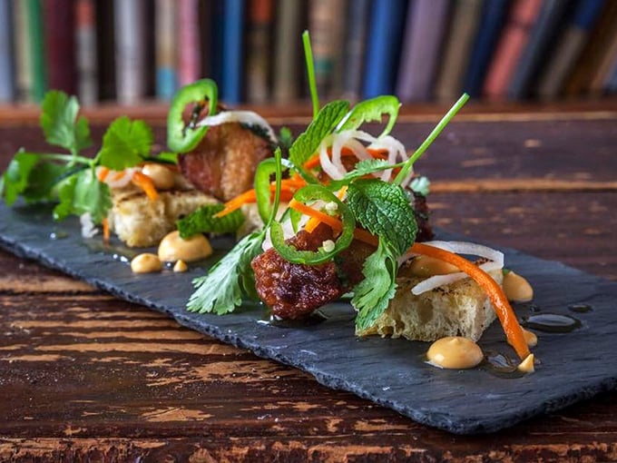Vietnamese pork belly that makes you question every other pork dish you've ever loved. Those vibrant garnishes aren't just pretty—they're flavor fireworks.