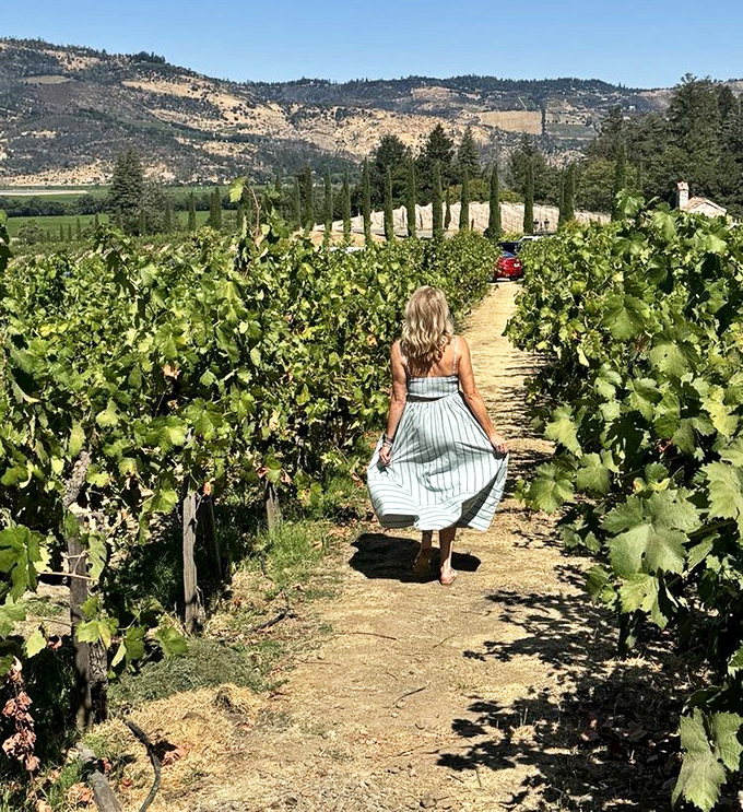 Wandering through vineyards that feed the castle's cellars. When your wine has a view this spectacular during its childhood, no wonder it turns out special.
