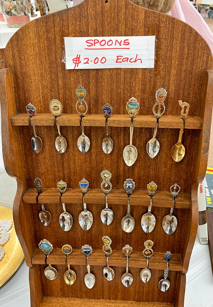 Not just spoons – tiny metal time machines! Each one a souvenir from someone else's vacation memories, now waiting for a new home.