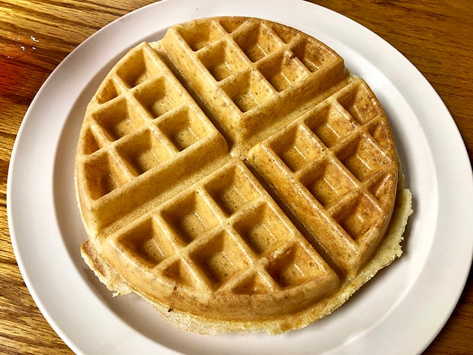The perfect waffle doesn't exi— Oh wait, here it is: golden-brown squares creating the ideal landscape of crispy peaks and butter-catching valleys.
