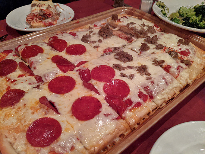 Old Forge's famous rectangular pizza makes its statement with a half-pepperoni, half-meat topping that settles the "what are we ordering" debate once and for all.