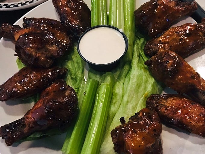 These wings aren't just glazed, they're practically lacquered with sauce – arranged like a delicious clock around a cooling dip of ranch.