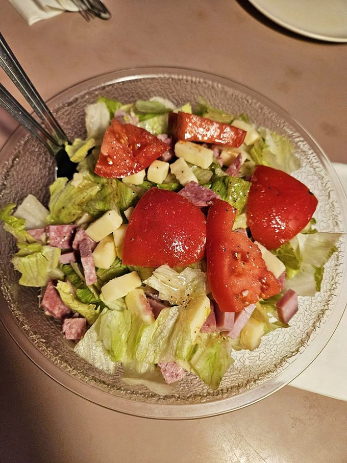 The antipasto salad—where vegetables pretend they're the star until you realize they're just opening acts for the pizza.