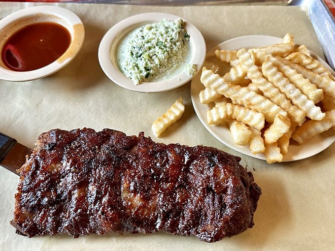 Ribs that don't need a fancy introduction—just a napkin and your undivided attention. The crinkle-cut fries are the perfect supporting cast.