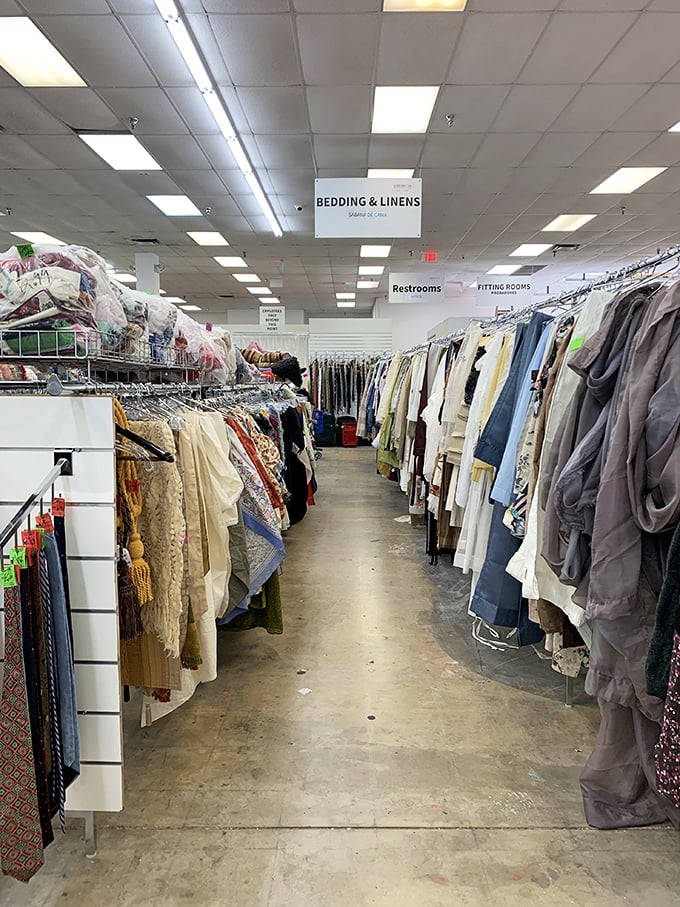 The bedding section: where vintage linens and contemporary comforters coexist like Florida's snowbirds and locals—somewhat reluctantly but making it work.