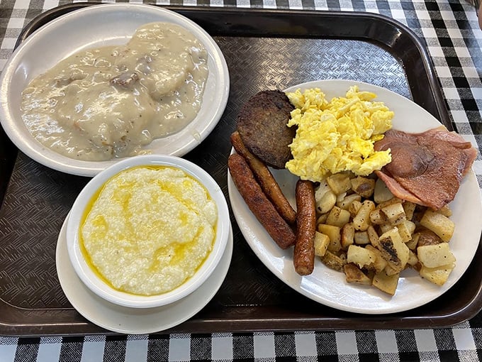 Breakfast nirvana: eggs, bacon, sausage, country ham, grits, and biscuits with gravy. The plate that launches a thousand satisfied sighs across Georgia.